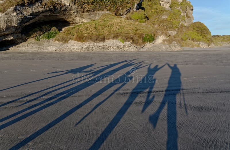 Shadows of People on a Sandy Beach Stock Image - Image of artistic ...