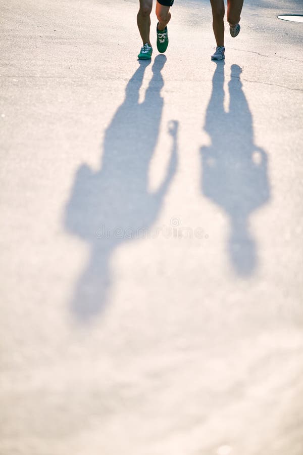 Shadows of runners stock image. Image of girl, personal - 57561653