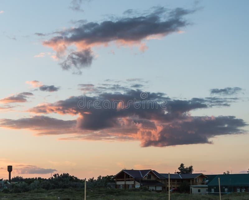 Shadows at Sunset Clouds Over Beach Stock Photo - Image of skyline ...