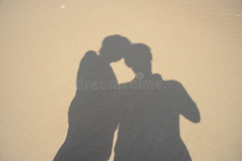 Shadows Two People on Beach Stock Image - Image of seashore, beach ...