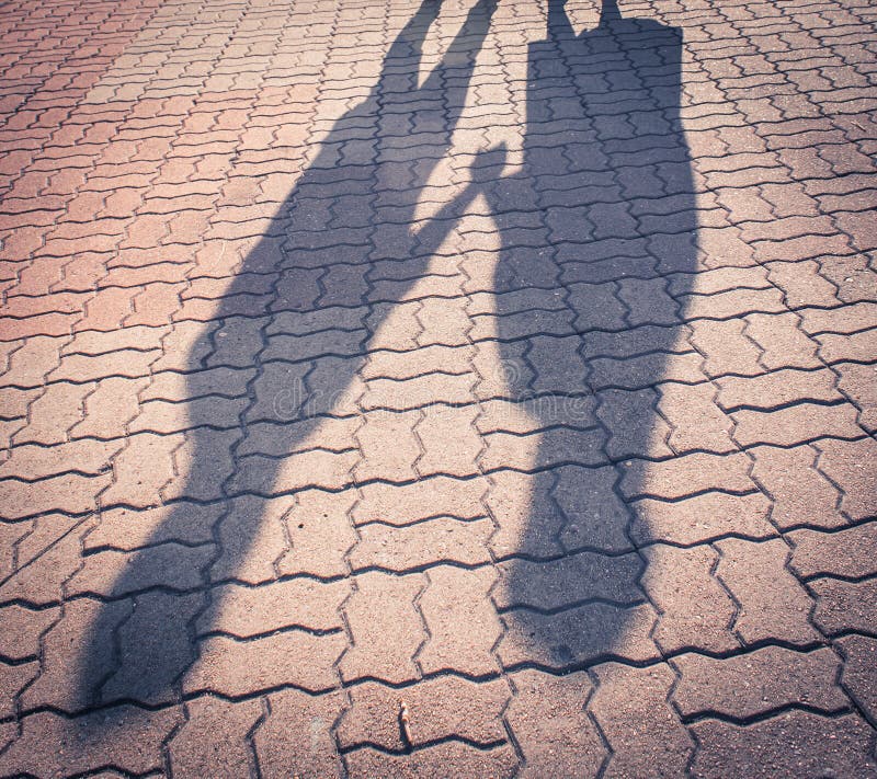 Shadows two people stock image. Image of grass, person - 57573947 Shadows two people stock image. Image of grass, person - 57573947