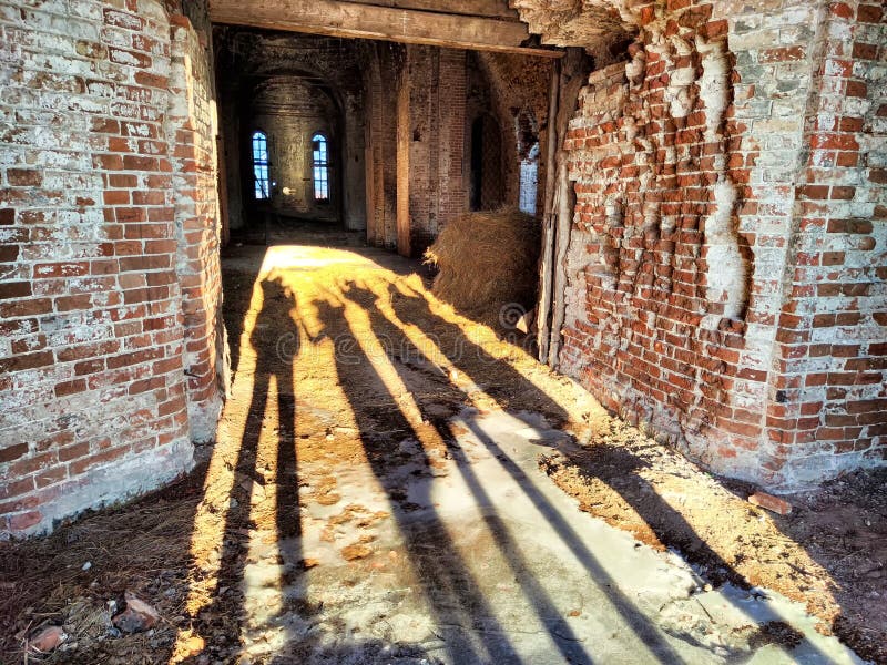 Shadows of Visitors on the Rustic Floor Inside an Abandoned Brick ...