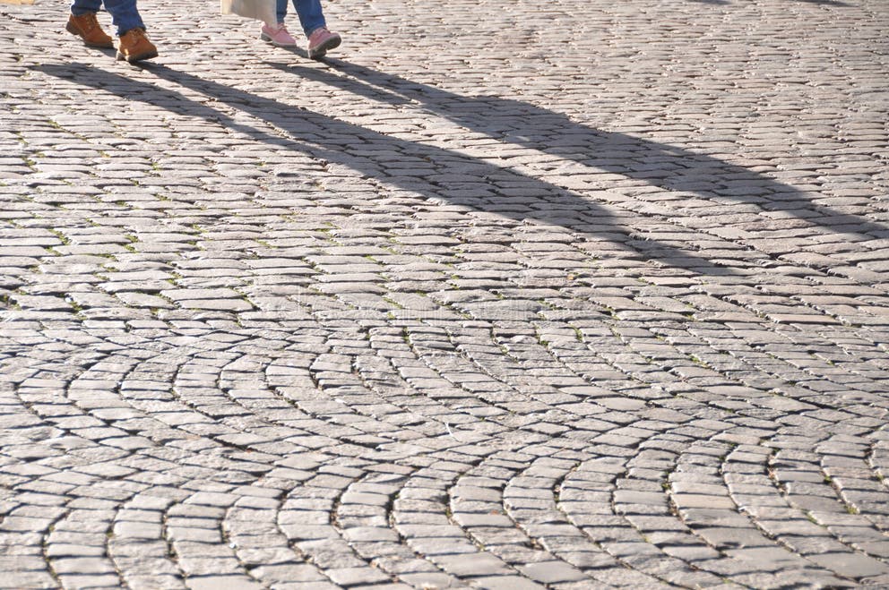 Shadows of walking feet stock photo. Image of detail - 37523128