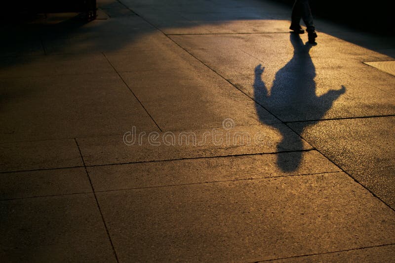 Shadows of walking man stock photo. Image of moving - 169353628