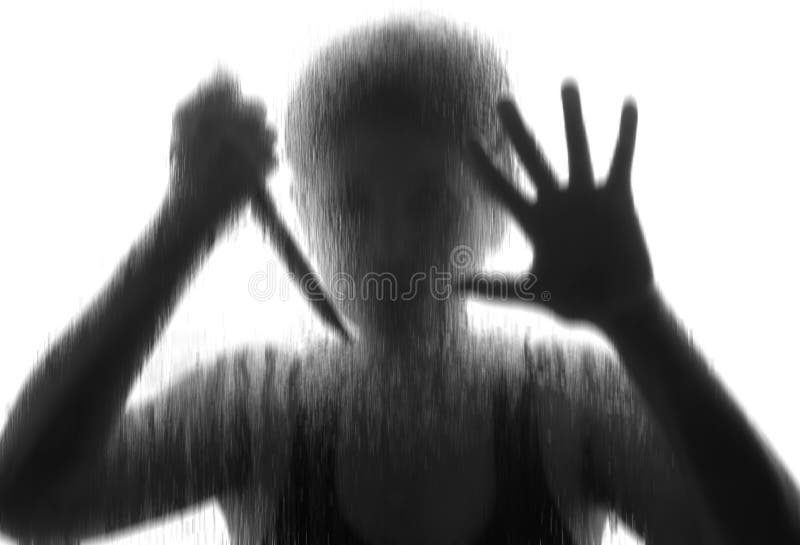 Shadowy Figure with a Knife Behind Glass Stock Photo - Image of focus ...