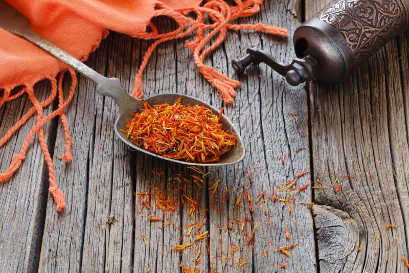Shafran in a Spoon on Wooden Table with Silk Cloth Stock Image - Image ...