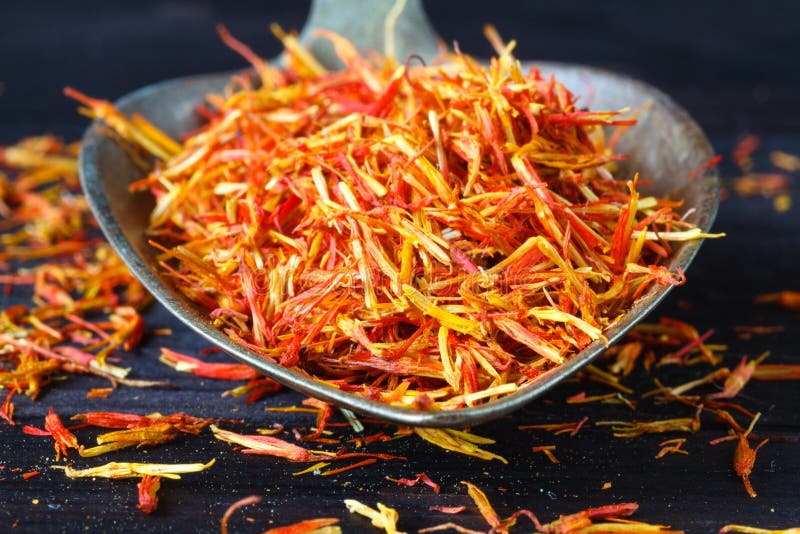 Shafran in Vintage Metal Spoon on Rustic Table Stock Image - Image of ...