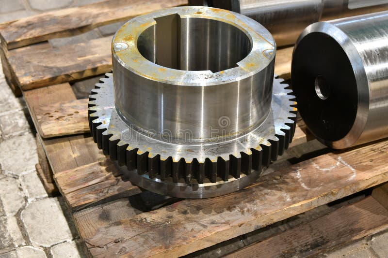 Shaft and Gear on a Rack after Turning, Milling and Gear Cutting on a ...