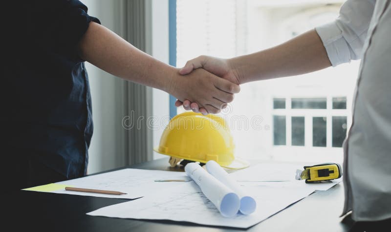 Shake a Hand, Team of Engineers and Architects, Working Team, Meeting ... Shake a Hand, Team of Engineers and Architects, Working Team, Meeting ...
