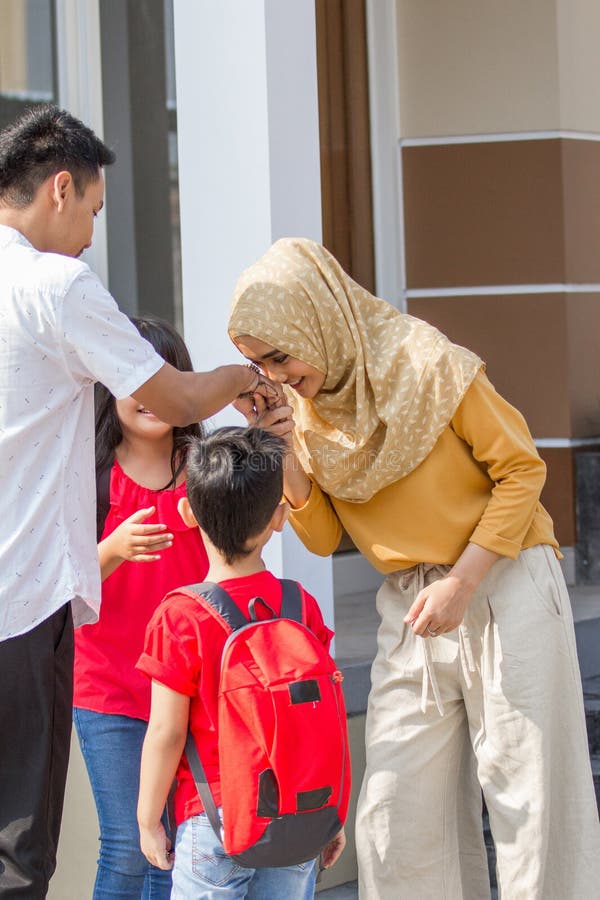 Shake Hand To Parent before Going To School Stock Photo - Image of girl ...