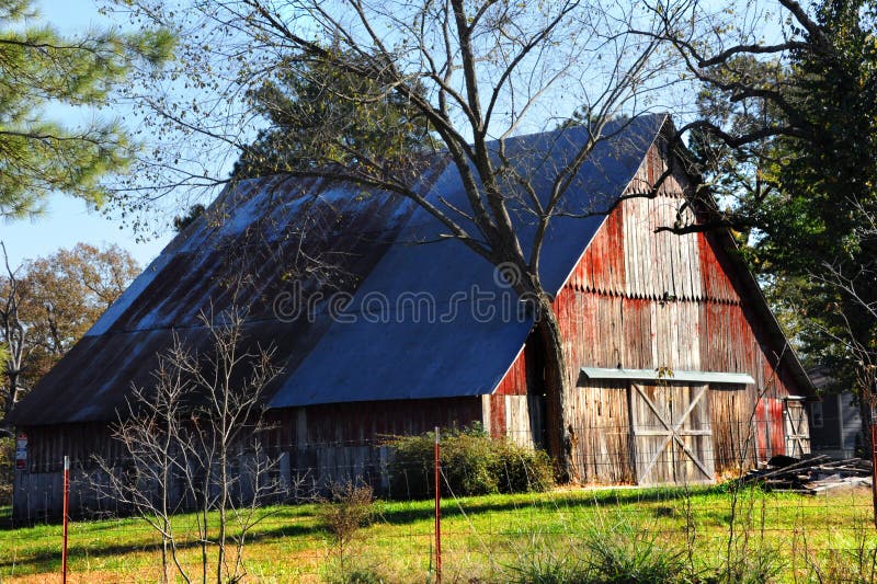 Shaker Barn Complex with Collection of Antique Wagons Stock Photo ...
