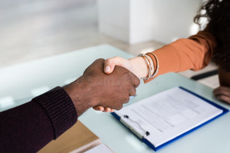 Shaking Hands at Interview Meeting Stock Image - Image of papers ...