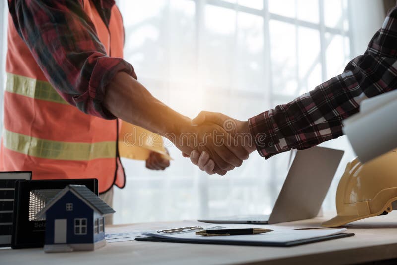 Shaking Hands, Professional Engineering Solar Planning Blueprint with ...