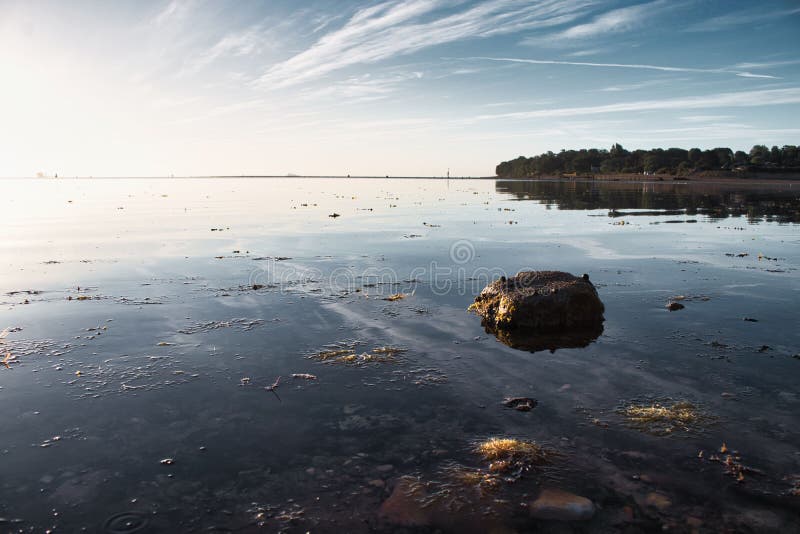 Shallow Beach Near with a Mesmerizing Landscape and Skyline Stock Image ...