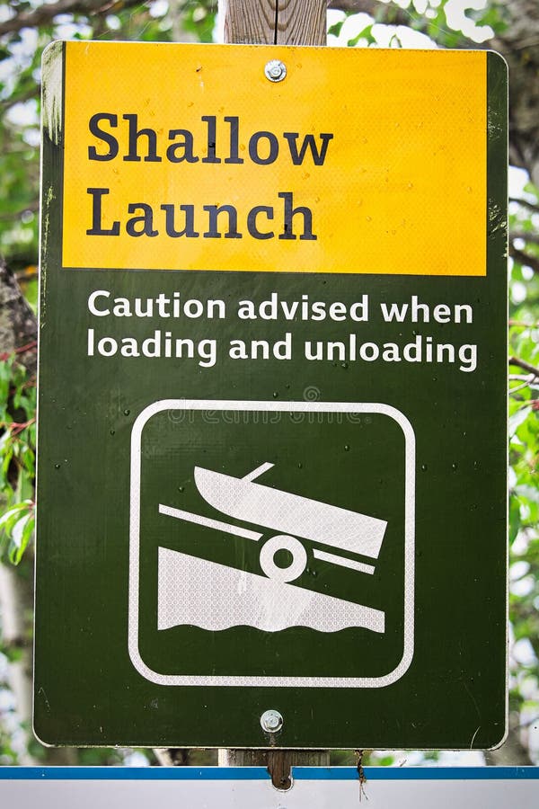 A Shallow Boat Launch Sign Advising Caution Stock Photo - Image of ...