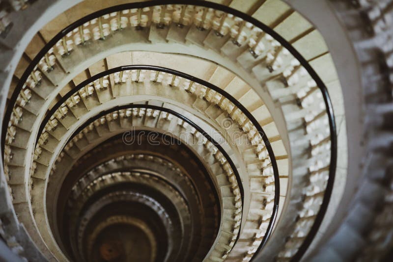 Very Deep Descending Spiral Staircase Stock Image - Image of ...