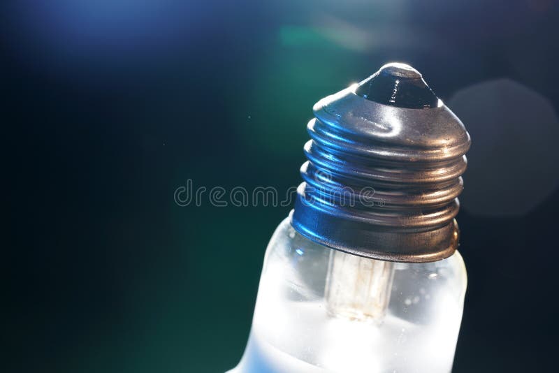 Shallow Focus of a Light Bulb on Dark Background Stock Photo - Image of ...