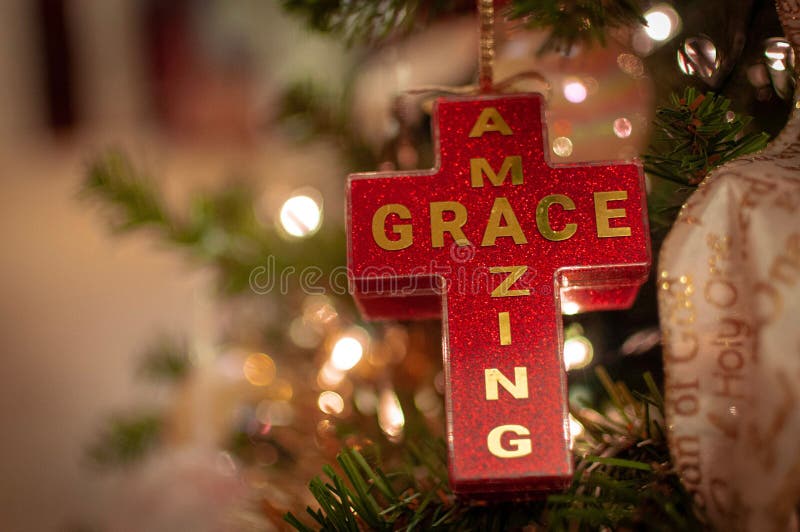 Shallow Focus of a Red Cross with Amazing Grace Text with Blur ...