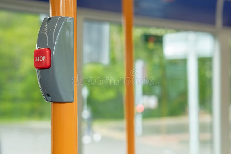 Shallow Focus of a Red Stop Button Seen Inside a Public Bus. Stock ...