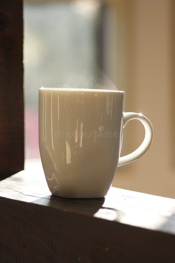 Shallow Focus Shot of a Coffee Cup in the Morning Stock Photo - Image ...