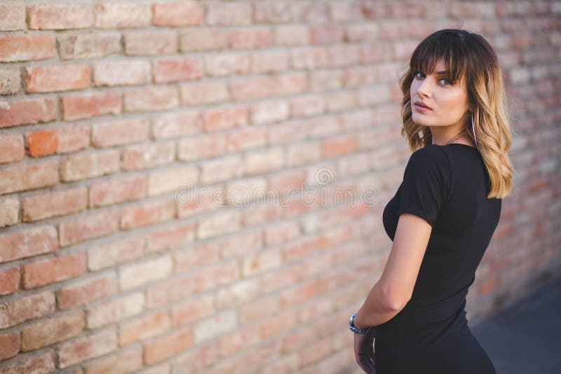 Shallow Focus Shot of a Confident Caucasian Female Posing for the ...