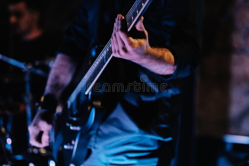 Shallow Focus Shot of the Guitarist at the Concert Stock Image - Image ...