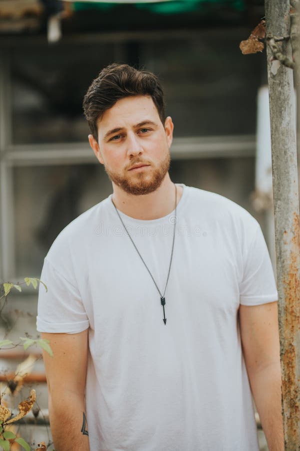 Shallow Focus Shot of a Young and Attractive Male Posing at Camera ...