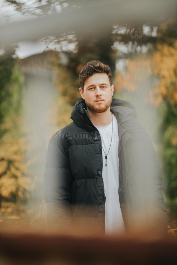 Shallow Focus Shot of a Young and Attractive Male Posing at Camera ...