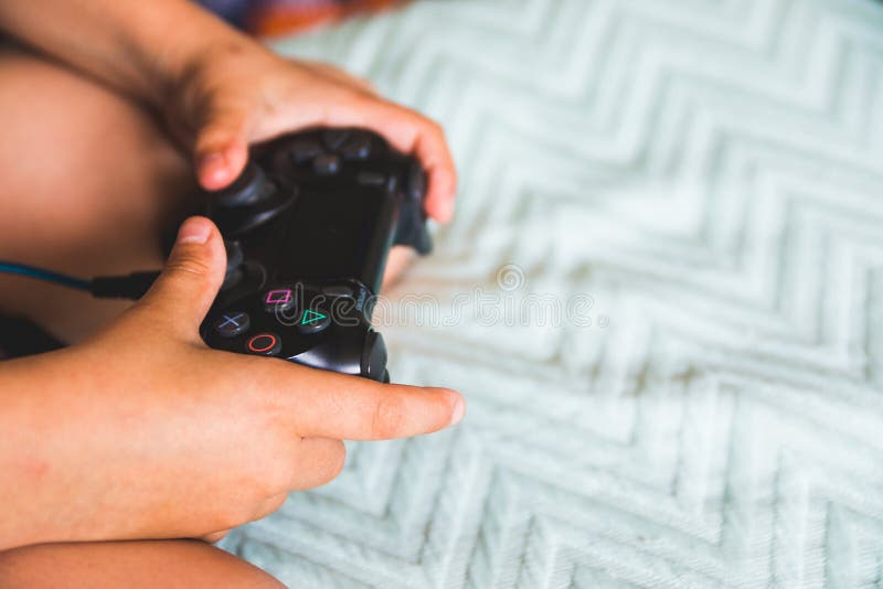 Shallow Focus Shot of a Young Boy Playing Computer Games with a ...