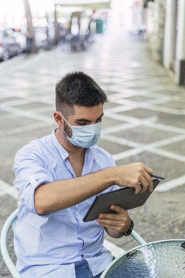 Shallow Focus Shot of a Young Brunette Male with a Face Mask Stock ...