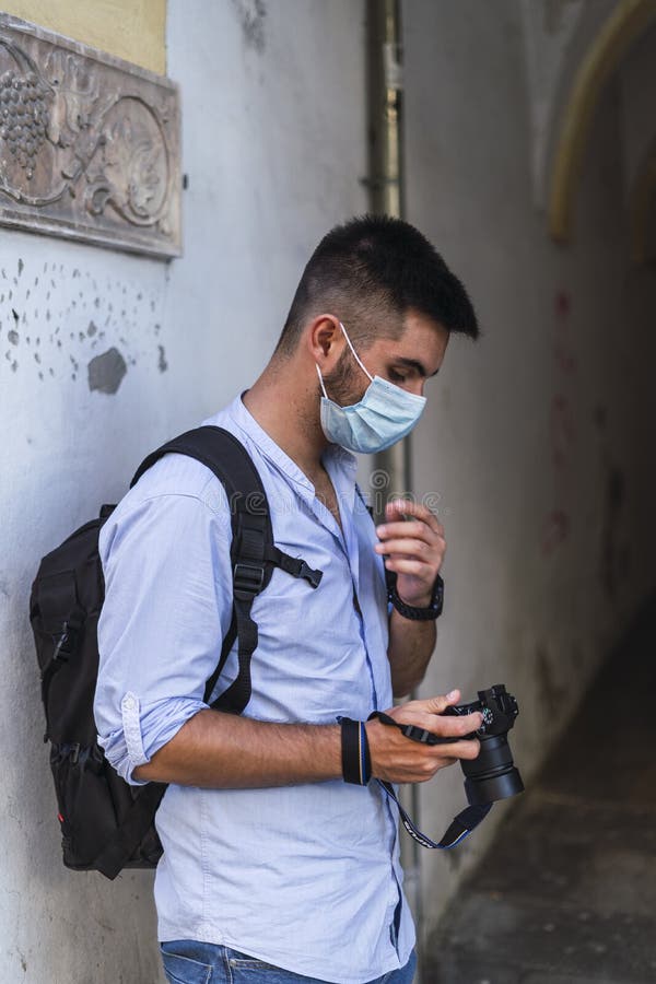 Shallow Focus Shot of a Young Brunette Male with a Face Mask Stock ...