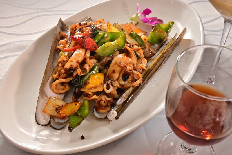 Shallow fried Razor clams stock image. Image of green - 237846449