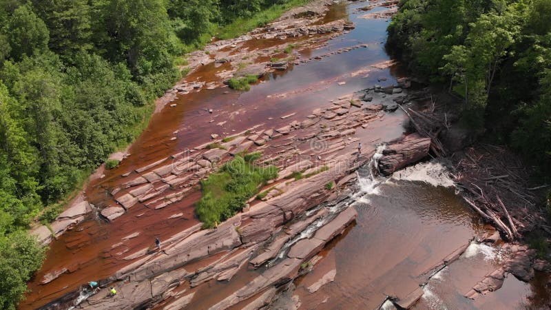 Shallow River with Red Rocks in the Woods. Stock Footage - Video of ...