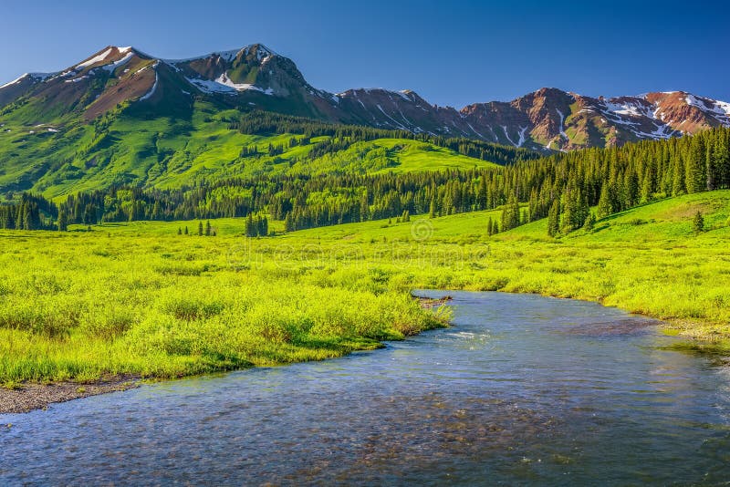 Rolling Mountain Landscape Viewed From The Side Of A Rocky Mountain ...
