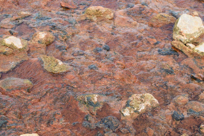 Low Running Red Rusty Water with Rocks Stock Photo - Image of shallow ...