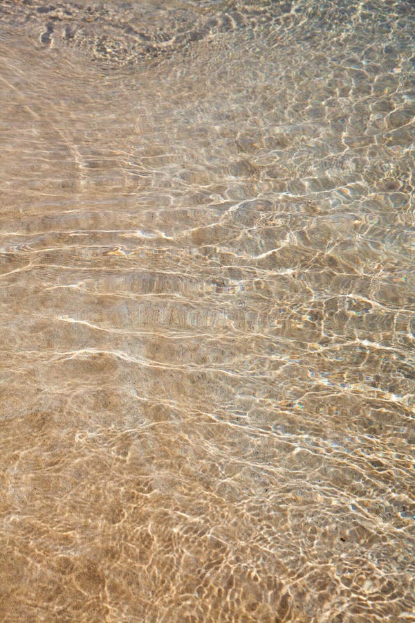 Shallow water over sand stock photo. Image of coast, surface - 60988342