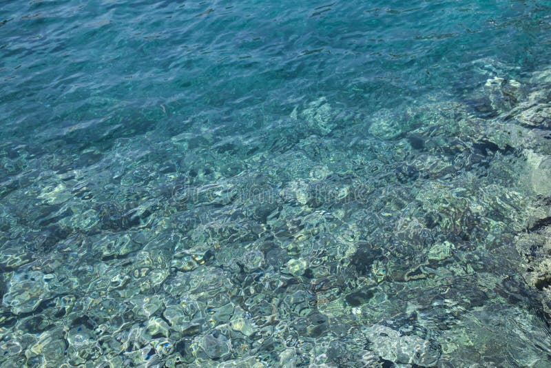 Shallow Water with Rocky Sea Bottom As Background Stock Image - Image ...