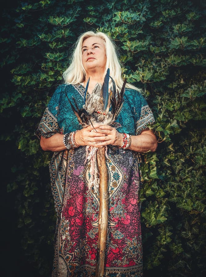 Shaman Woman with Feathers in Hand. Stock Photo - Image of mystical ...