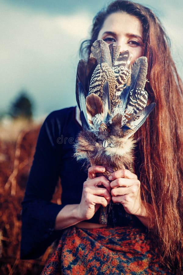 Shaman Woman and Shamanic Feathers on Denim. Stock Photo - Image of ...
