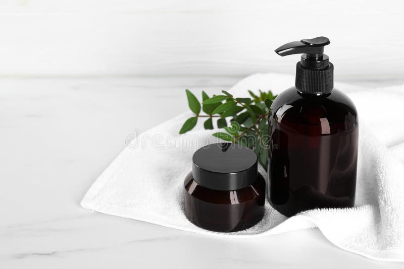 Shampoo Bottle, Hair Mask and Towel on White Marble Table, Space for ...