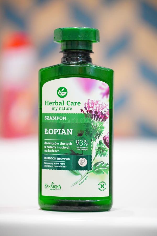 Shampoo in a Green Bottle on a Blurry Background. Editorial Image ...