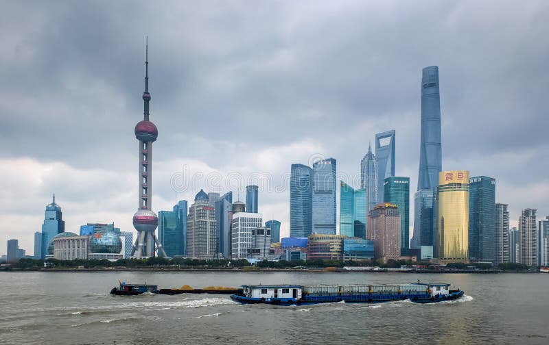 Shanghai Skyline on a Cloudy Day. Barges Floating on the River ...