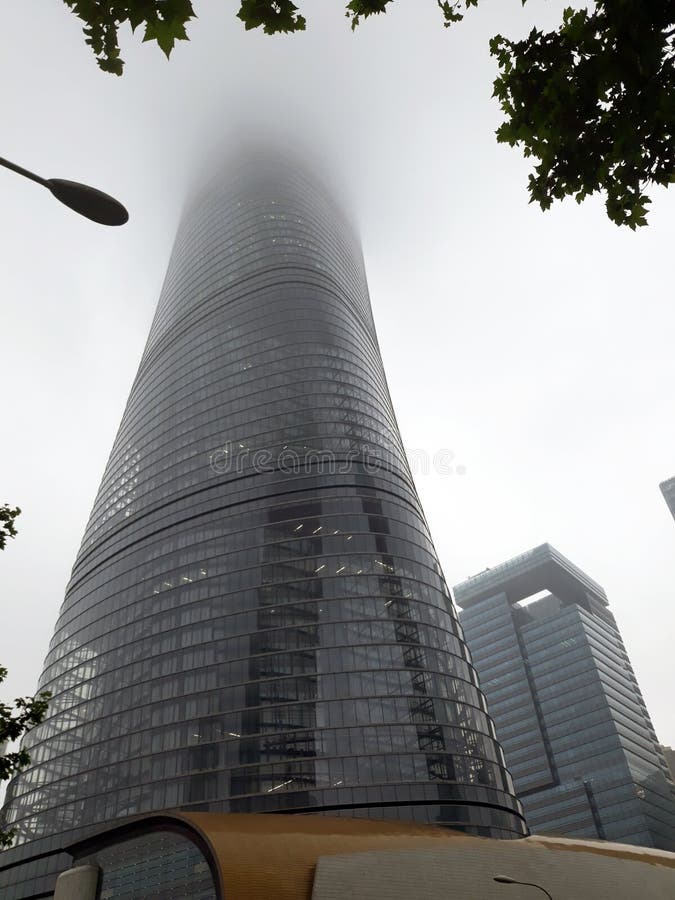 Shanghai Tower Disappearing in the Fog. Editorial Photo - Image of east ...