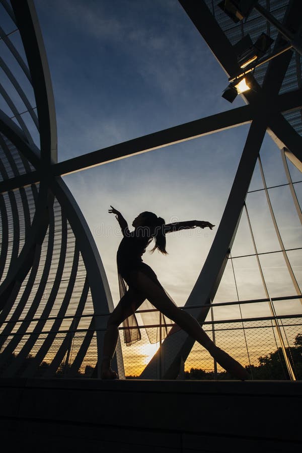 Shape of a Woman Dancing Classical Ballet on Bridge Stock Photo - Image ...