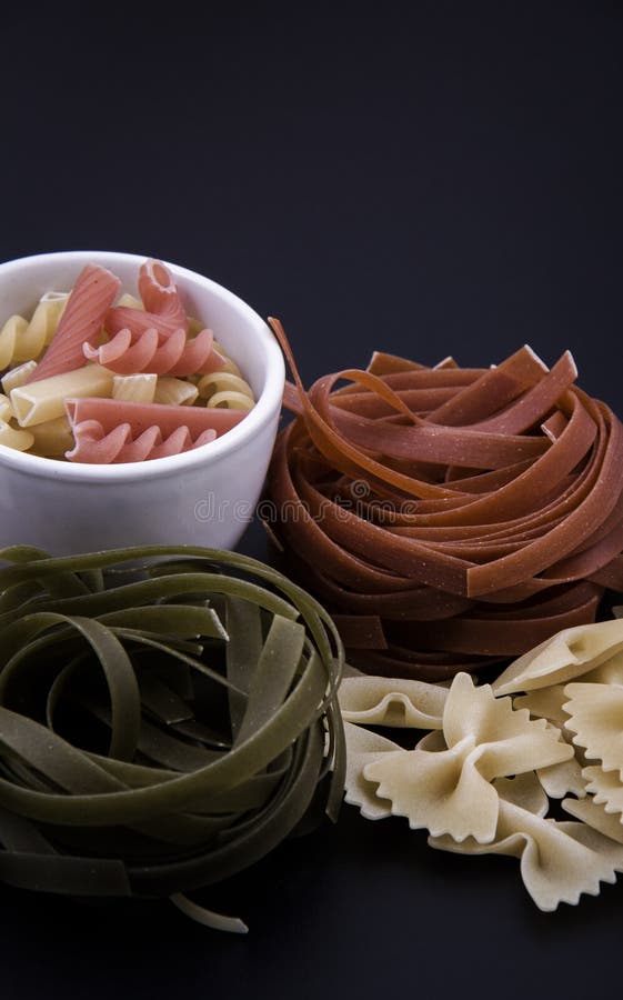 Shaped Pasta and Plain Pasta. Pasta with Different Shapes and Colors ...