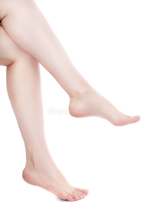 Shapely Female Legs. Isolation on a White Background Stock Photo ...
