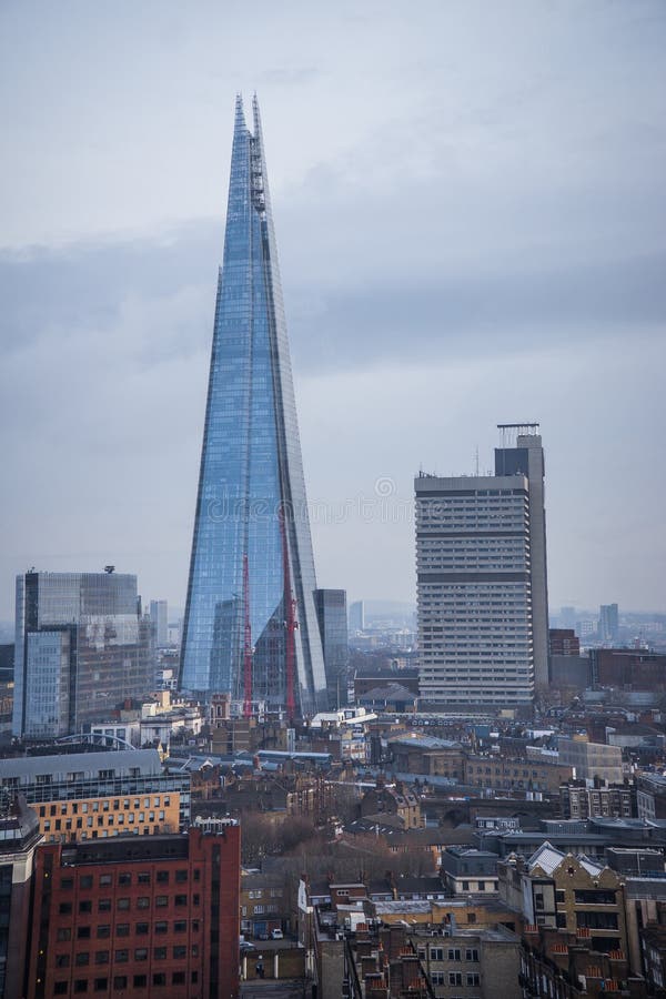 The Shard Skyscraper with Grey Clouds in the Sky. Editorial Photo ...