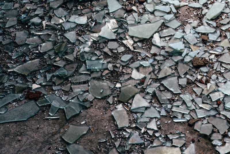 Shards of Broken Glass on Floor Stock Photo - Image of concrete, floor ...