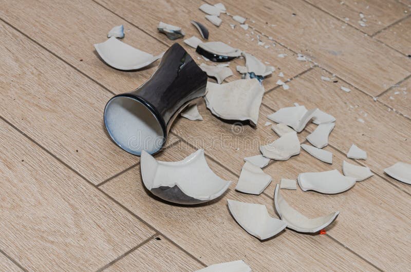Shards of a Broken Vase on the Floor Stock Photo - Image of ancient ...