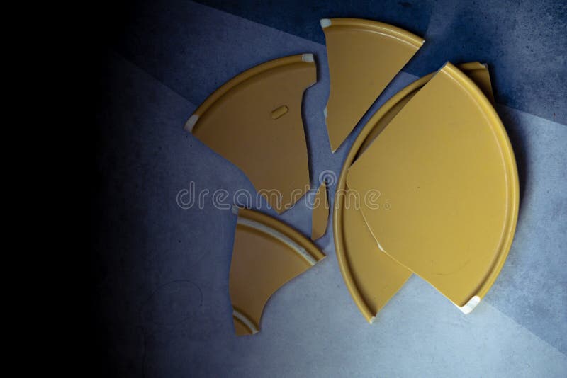 Shards of a Broken Yellow Dish Stock Image - Image of broken, empty ...